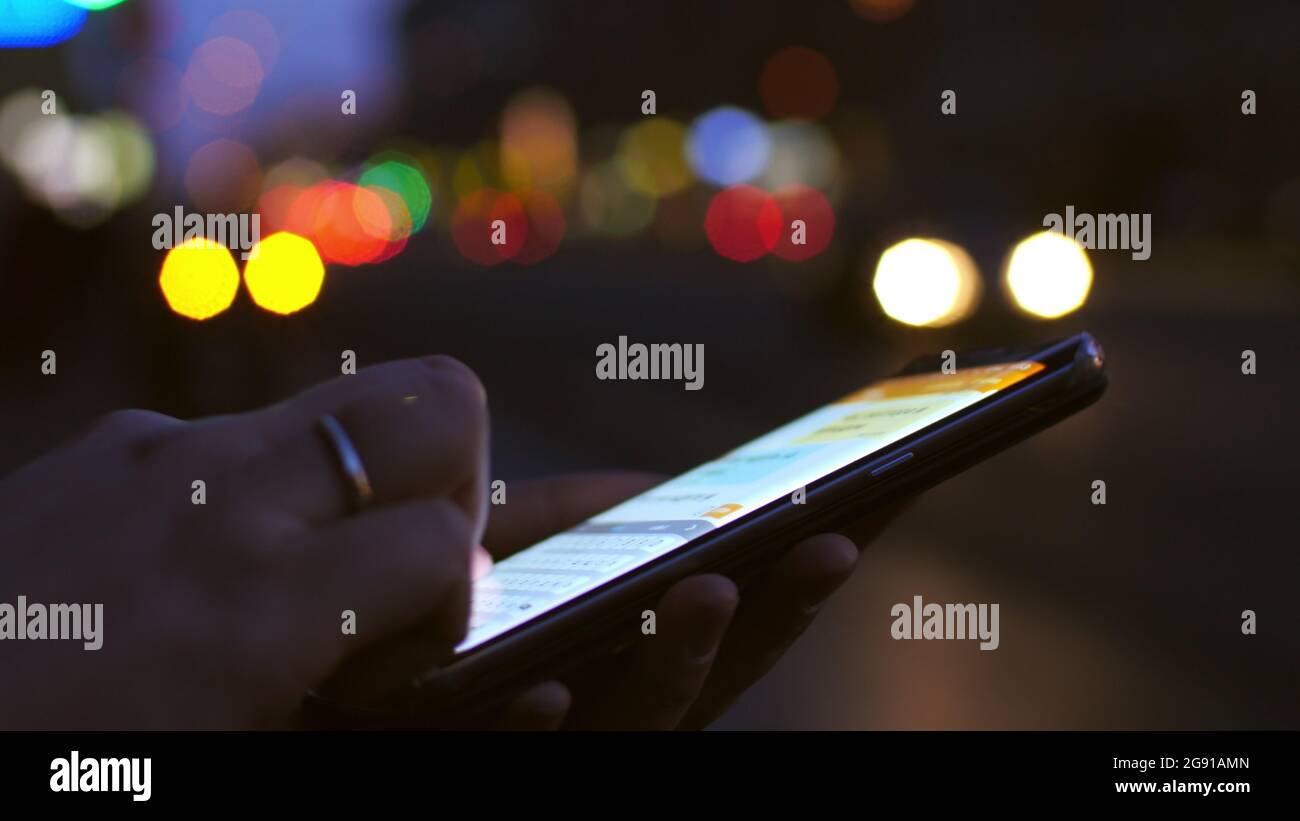 Night city mobile technology communications hi-res stock photography ...
