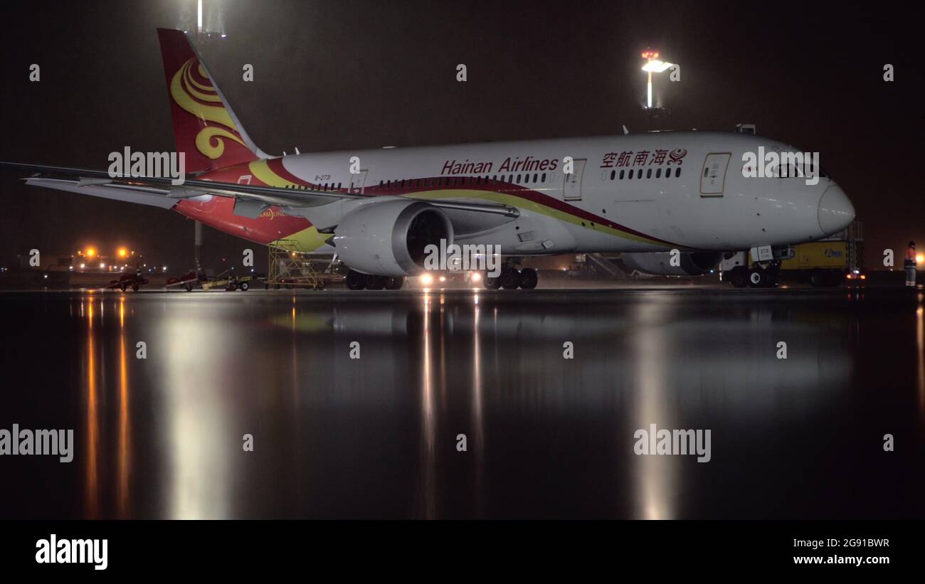 Hainan Airlines Boeing 787-8 Dreamliner parked in the airport at night ...