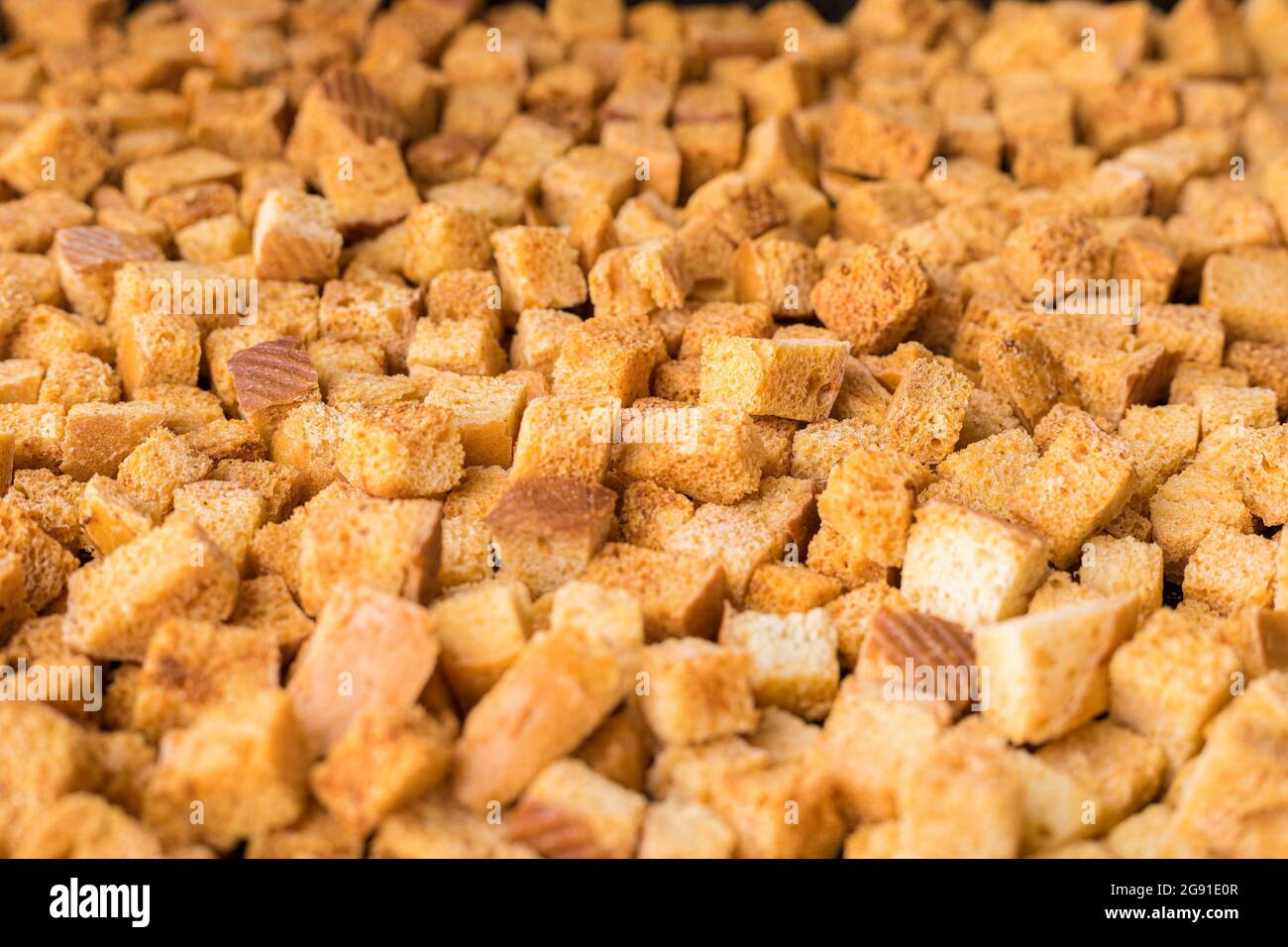 Square-shaped bread crumbs. Oven-fried golden brown bread crumbs ...
