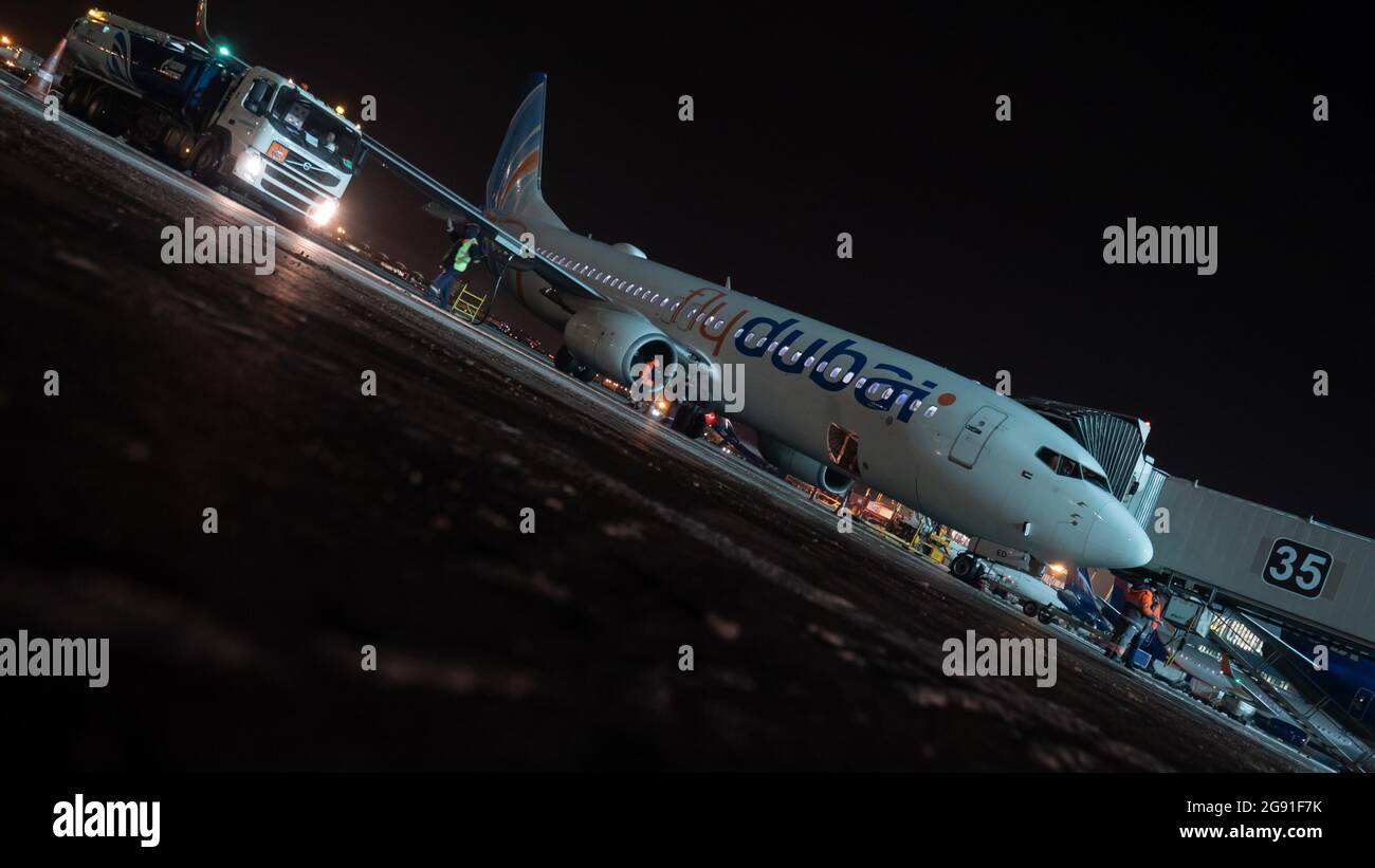 Timelapse of transport traffic and Flydubai plane boarding at night ...