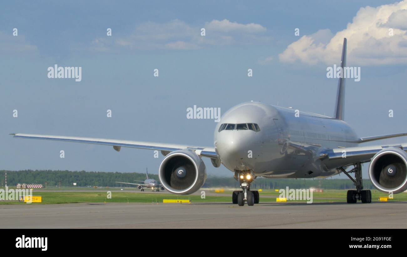 Two Planes Waiting For Take-Off Stock Photo - Alamy