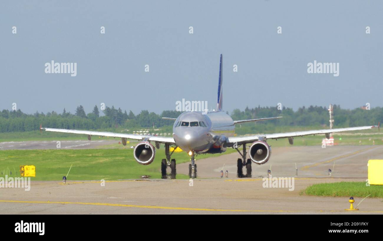 Jet Airplane On The Runway Stock Photo - Alamy