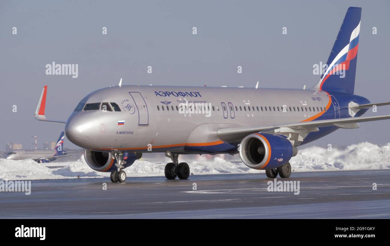 Aeroflot aircraft Airbus A320 on tarmac at the airport, winter view ...