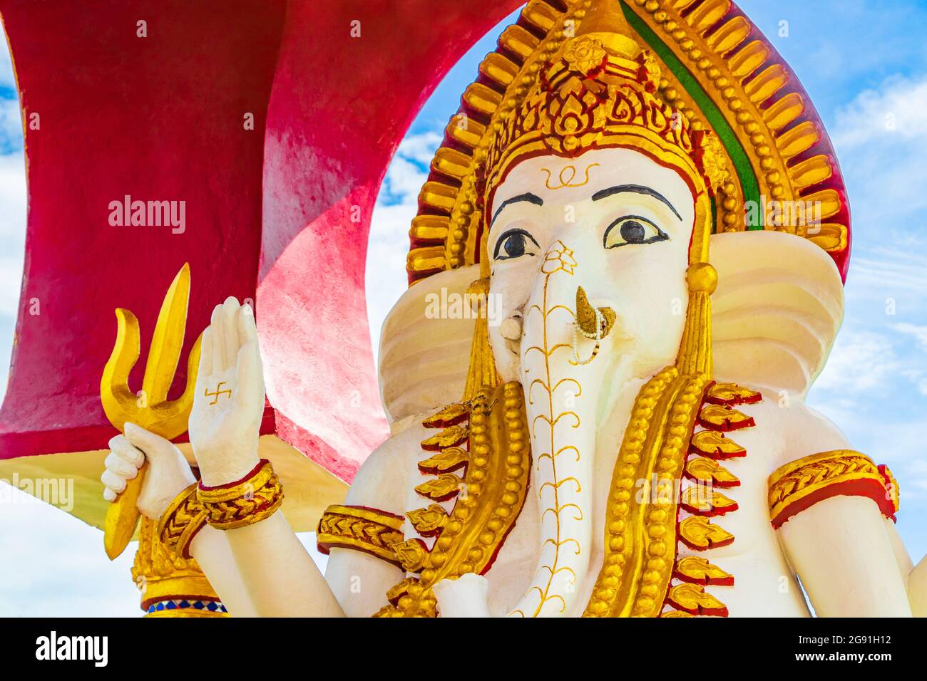 Colorful elephant god statue and architecture in Wat Plai Laem temple ...