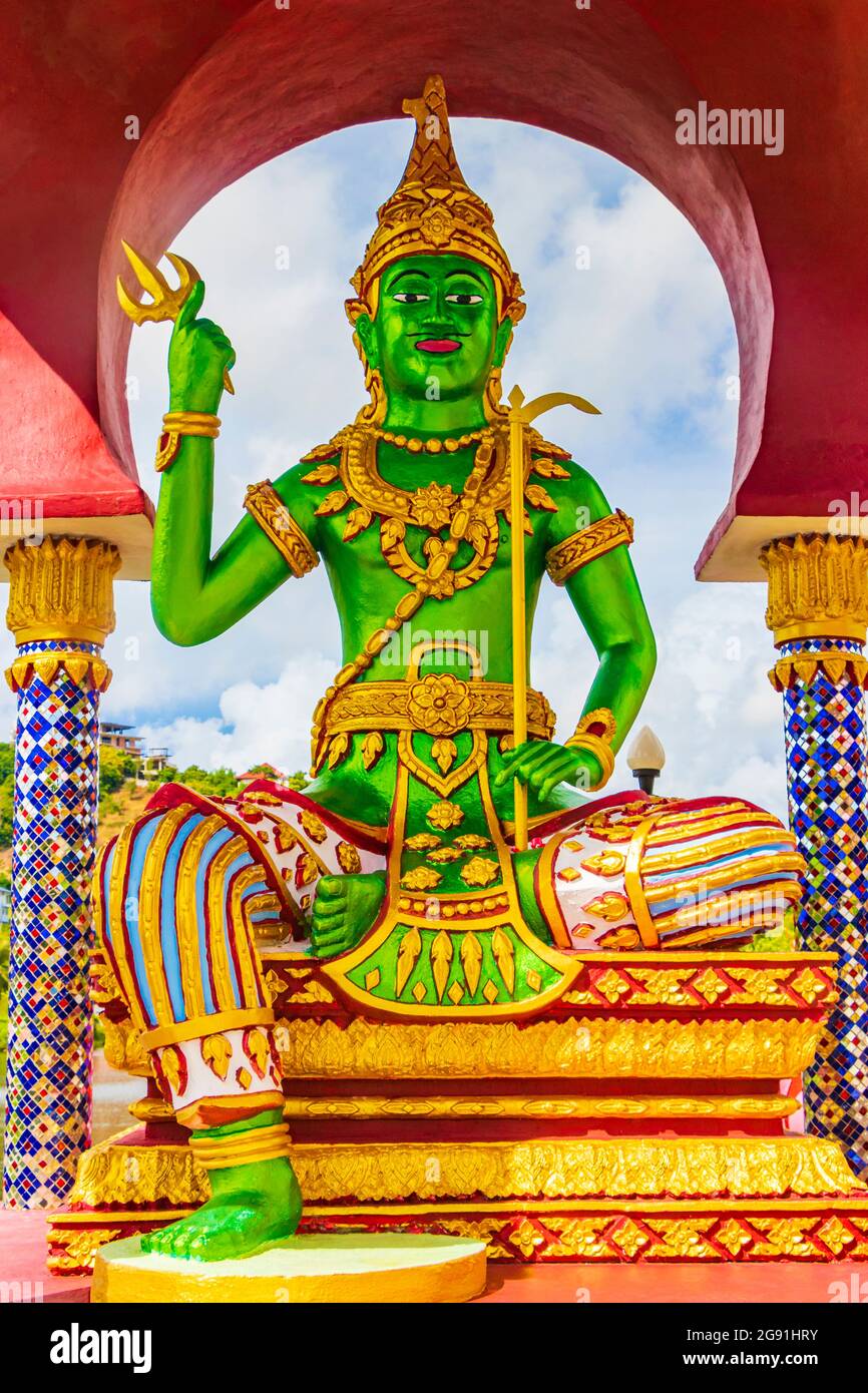 Green god statue and architecture in Wat Plai Laem temple on Koh Samui ...