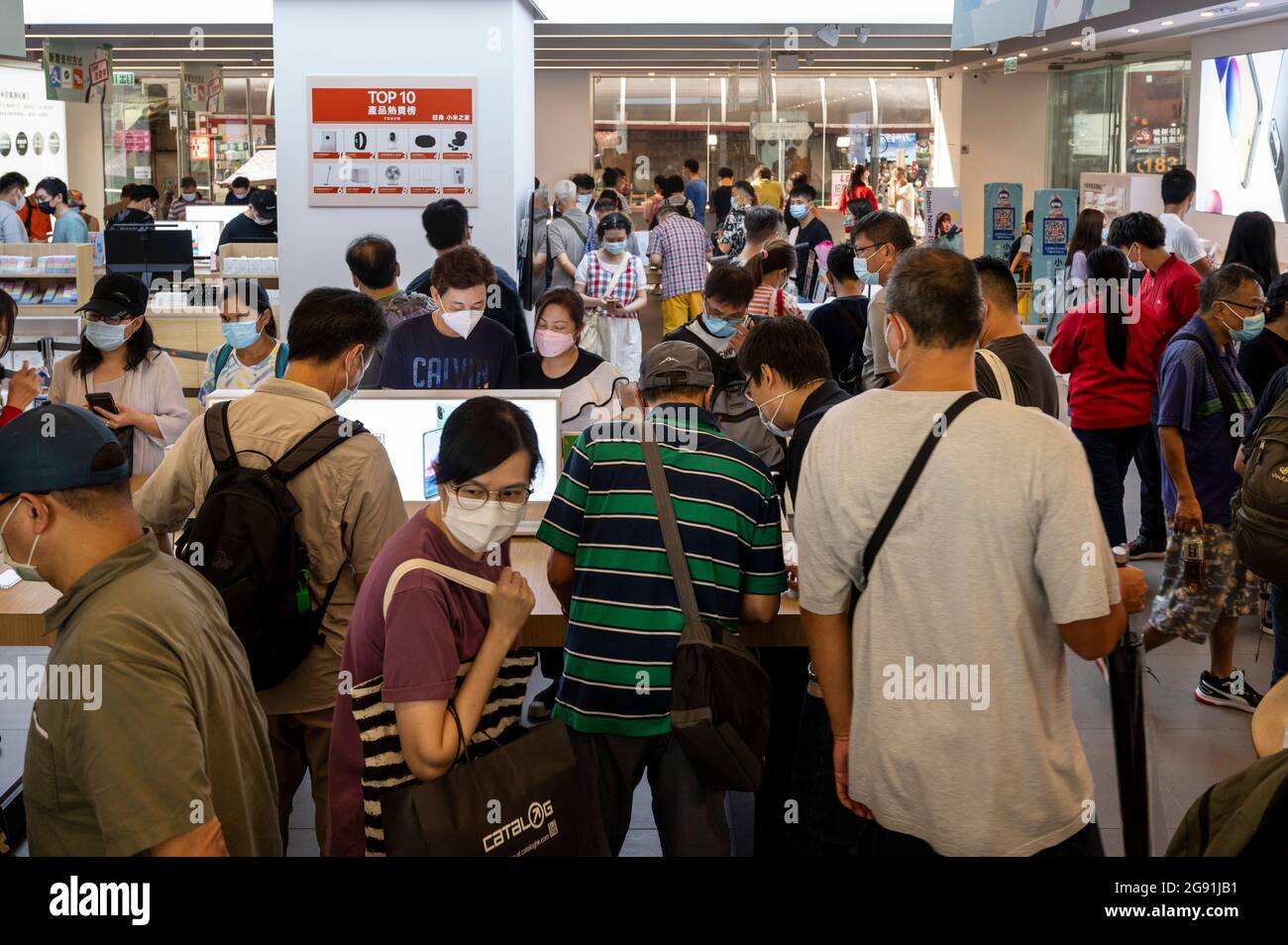 Shoppers are seen at the Chinese multinational technology and ...