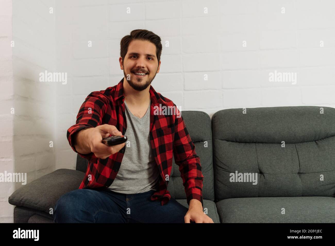 Changing the channel hi-res stock photography and images - Alamy