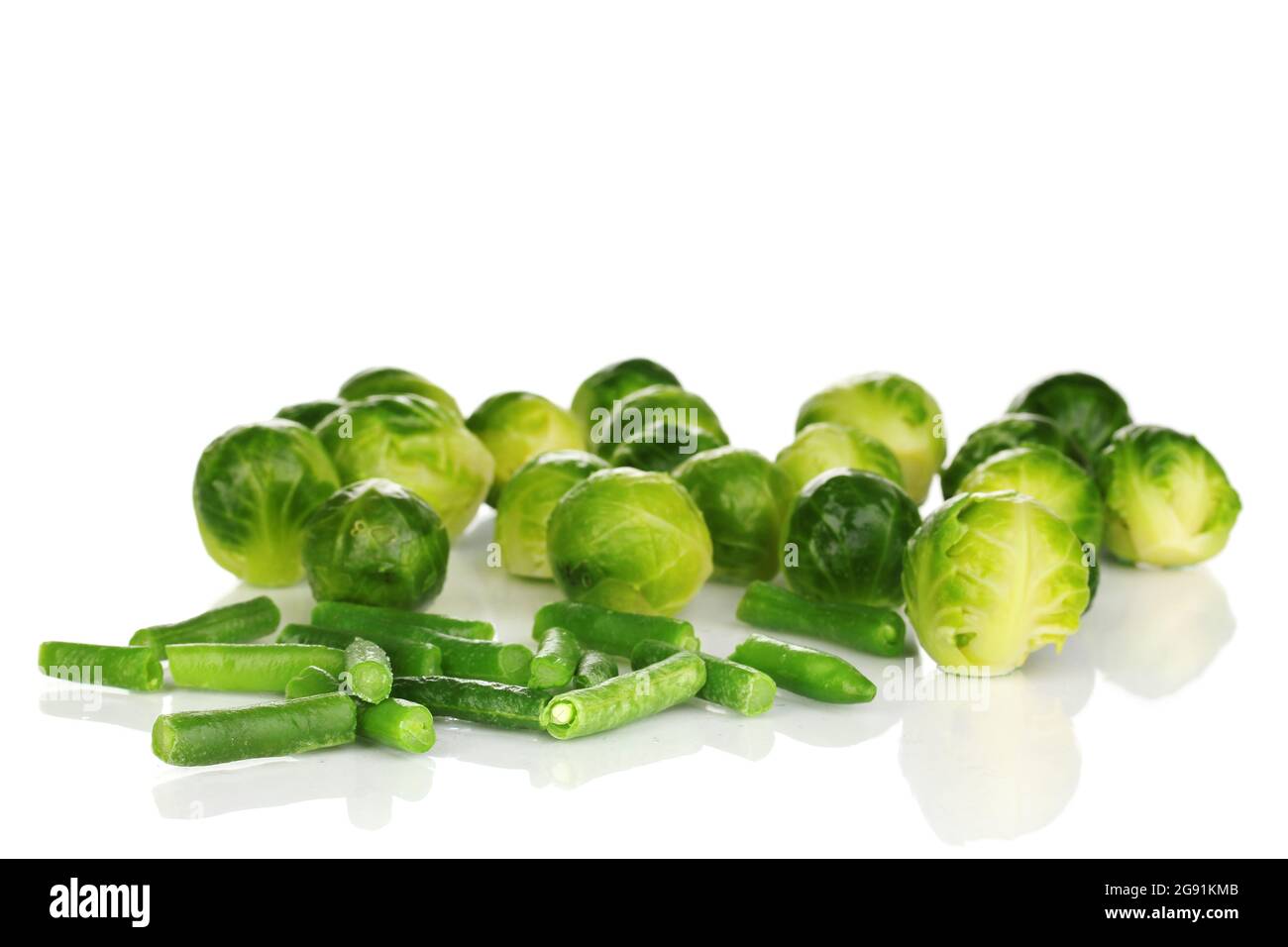 Fresh brussels sprouts and french bean isolated on white Stock Photo ...