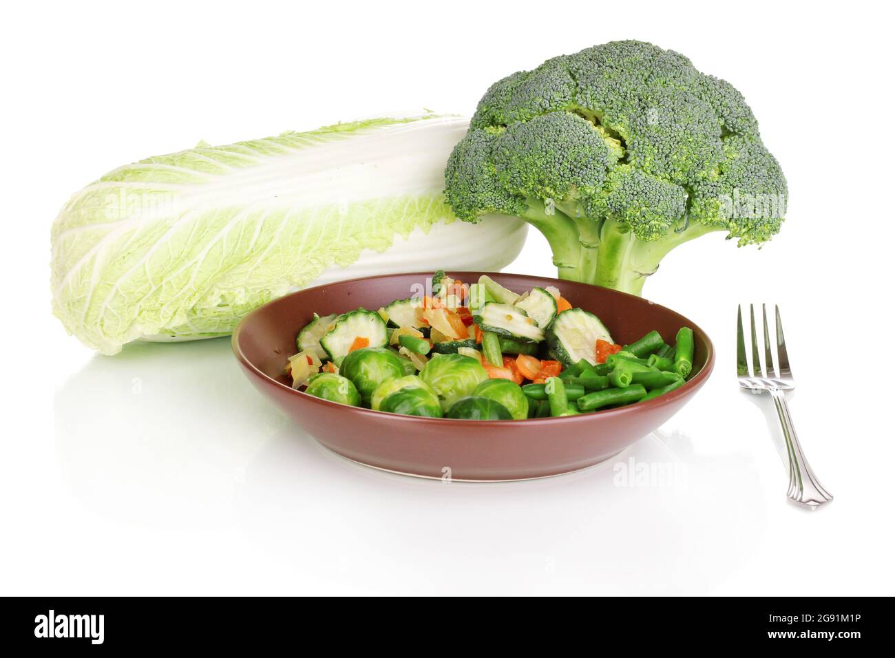 Mixed vegetables on plate isolated on white Stock Photo - Alamy