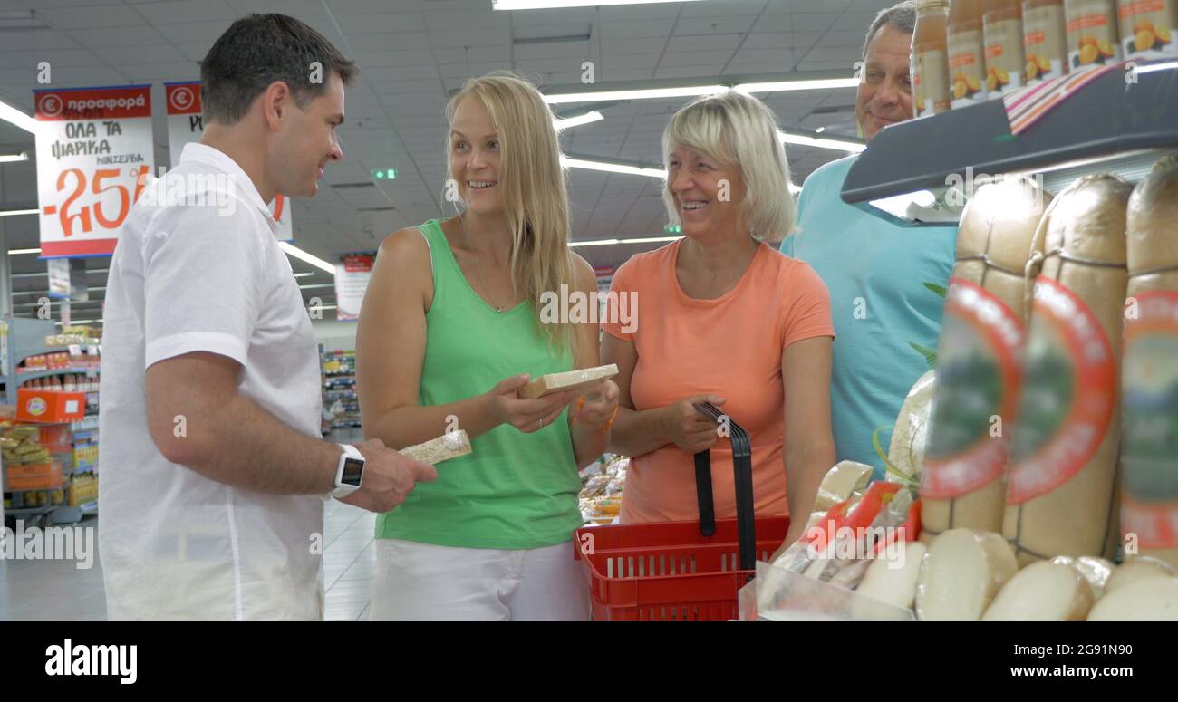 People by the Supermarket Shelf Stock Photo - Alamy