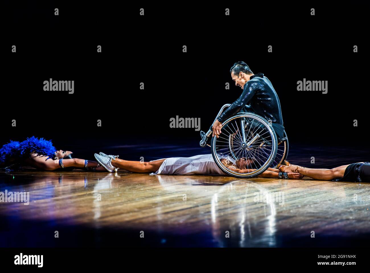 World Para Dance Sport champion Julius Obero seen riding his wheelchair ...
