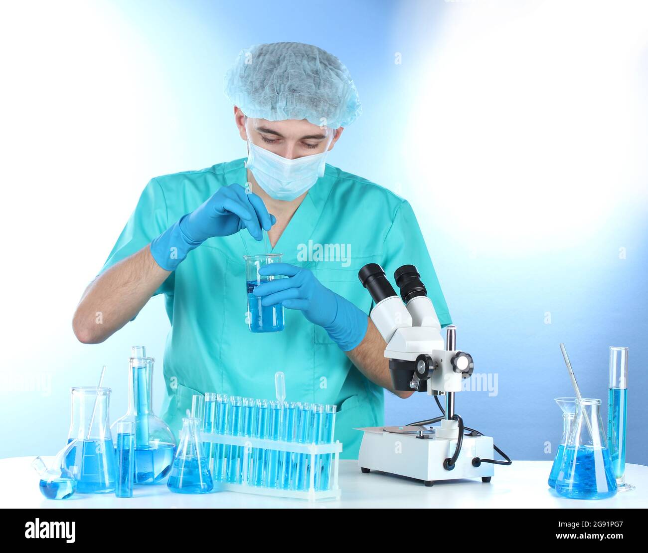 scientist in the lab working with chemicals test-tubes Stock Photo - Alamy