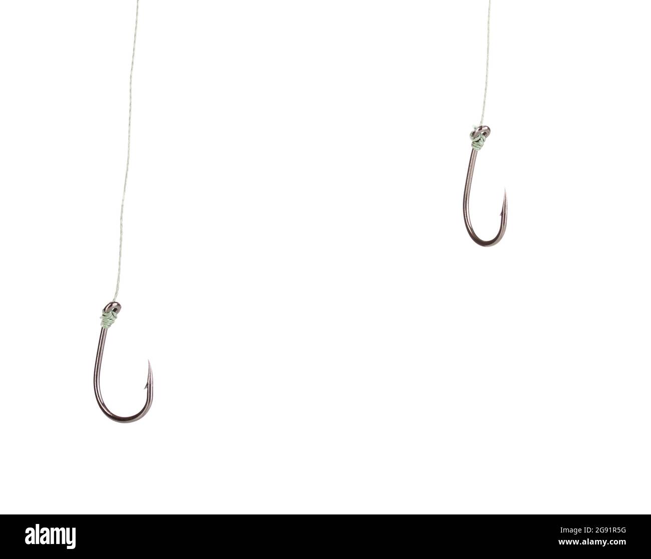Two single fish hooks isolated on white Stock Photo - Alamy