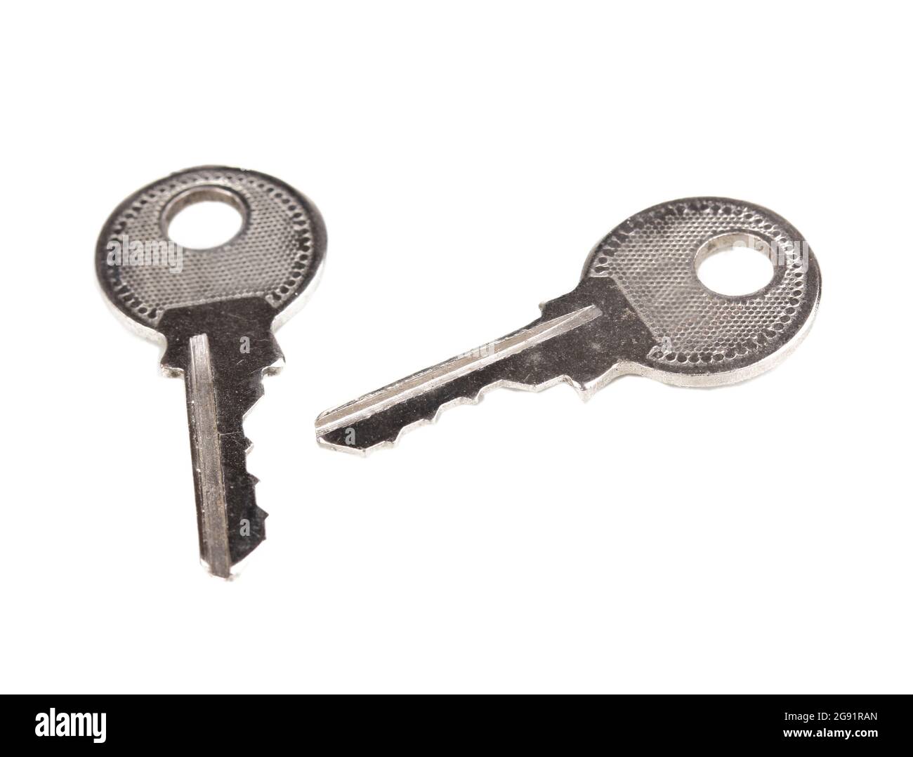 Two metal keys isolated on white Stock Photo - Alamy
