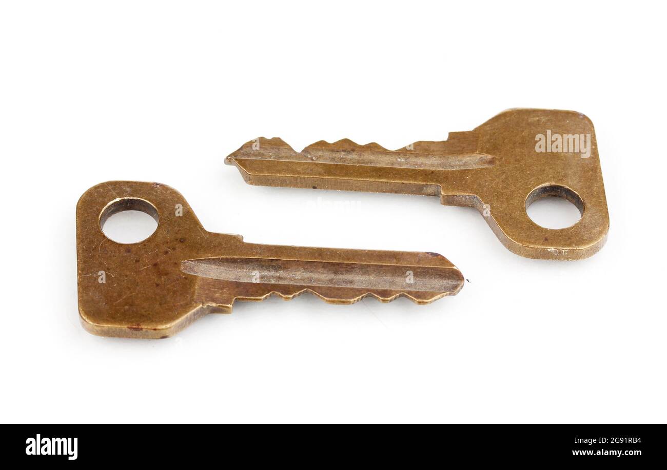Two metal keys isolated on white Stock Photo - Alamy