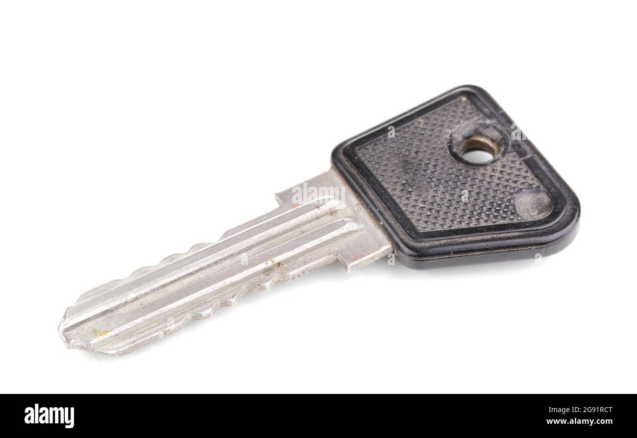 Metal key isolated on white Stock Photo - Alamy