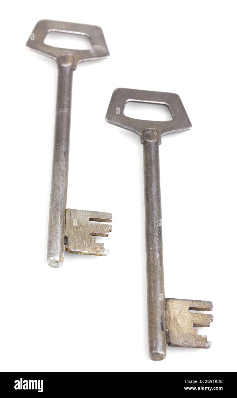 Two metal keys isolated on white Stock Photo - Alamy