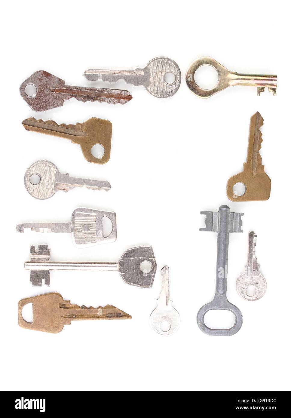 Many metal keys isolated on white Stock Photo - Alamy