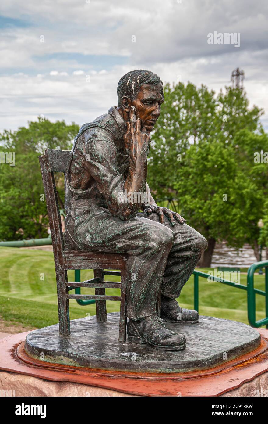 Sioux Falls, SD, USA - June 2, 2008: Closeup of thinking man on chair ...