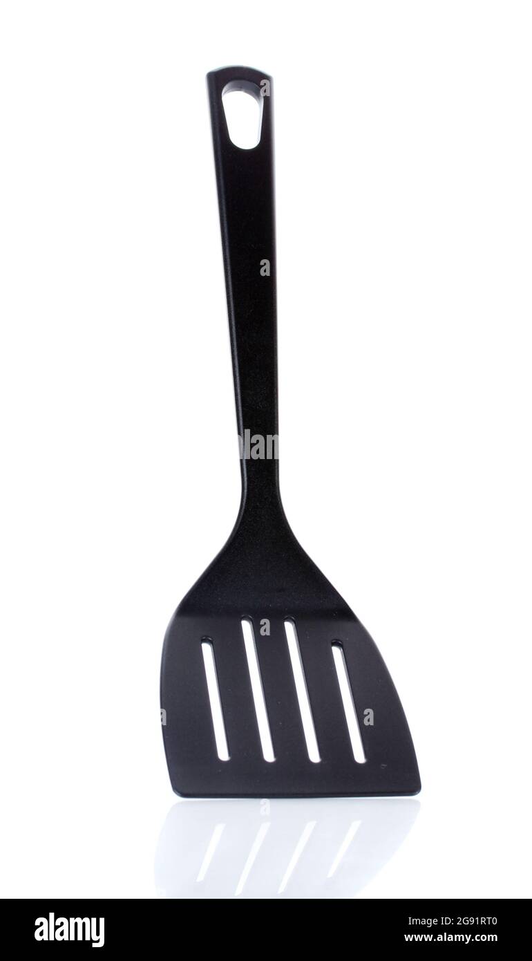 black kitchen spatula isolated on white Stock Photo - Alamy