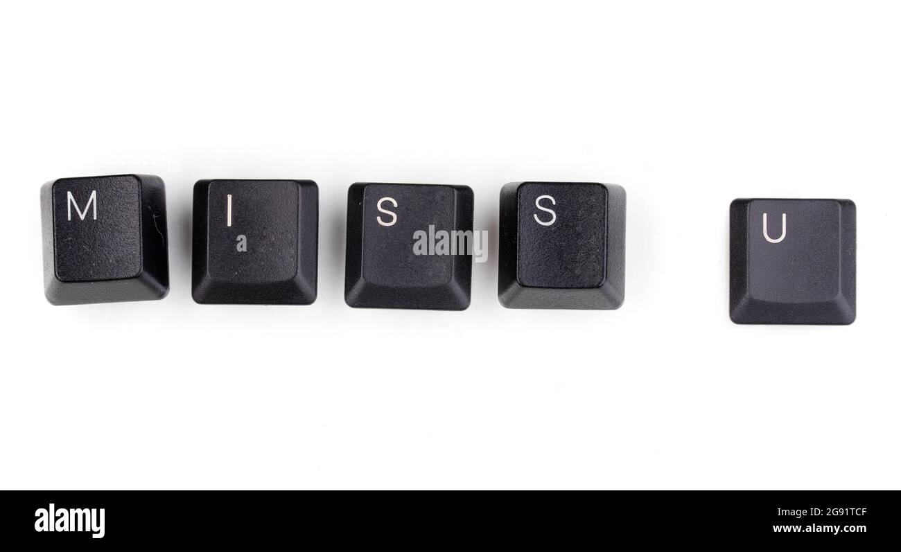 Keyboard keys saying miss u isolated on white Stock Photo - Alamy
