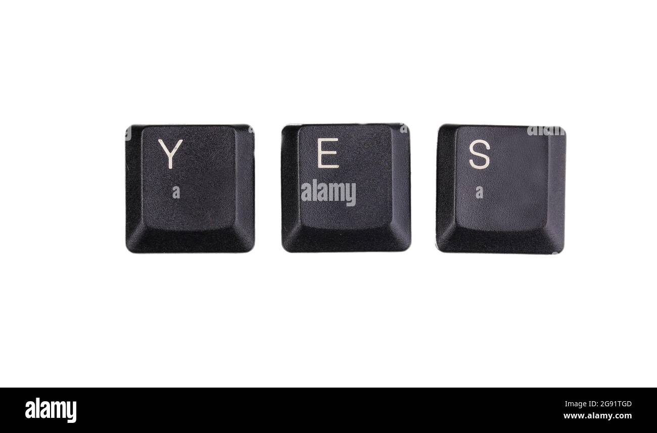 Keyboard keys saying yes isolated on white Stock Photo - Alamy