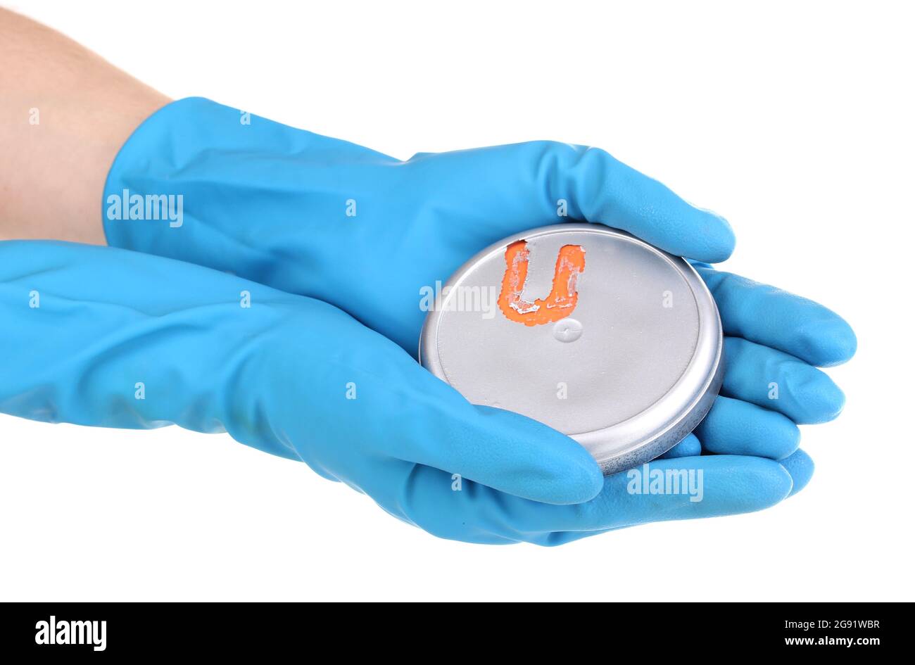 Uranium in hands isolated on white Stock Photo - Alamy