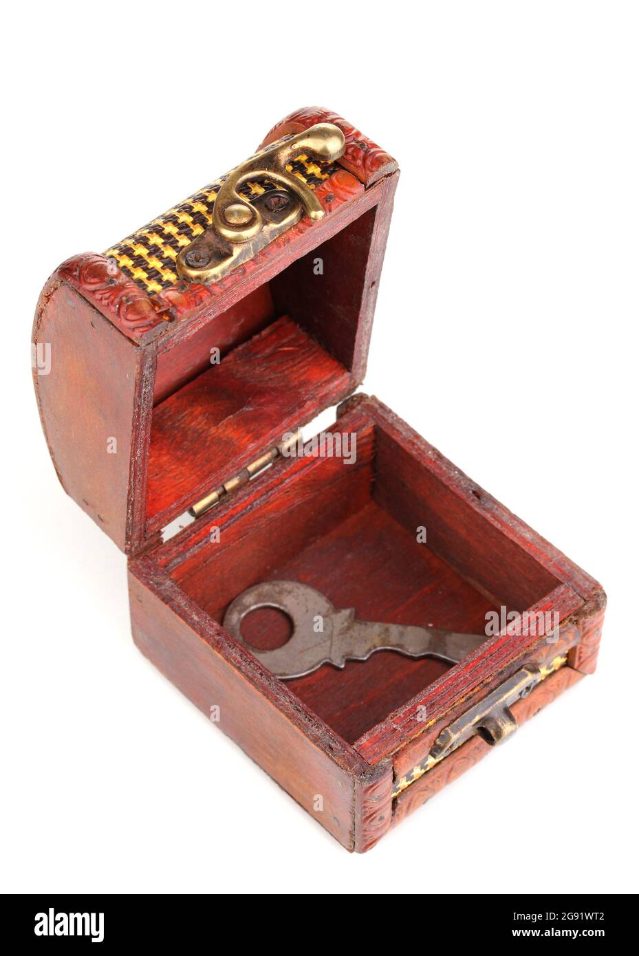 Key in chest isolated on white Stock Photo - Alamy