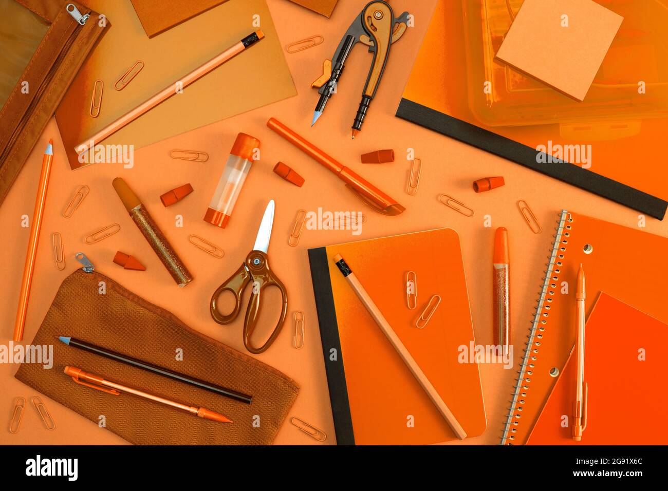 Orange Background of School and Office Supplies Stock Photo - Alamy