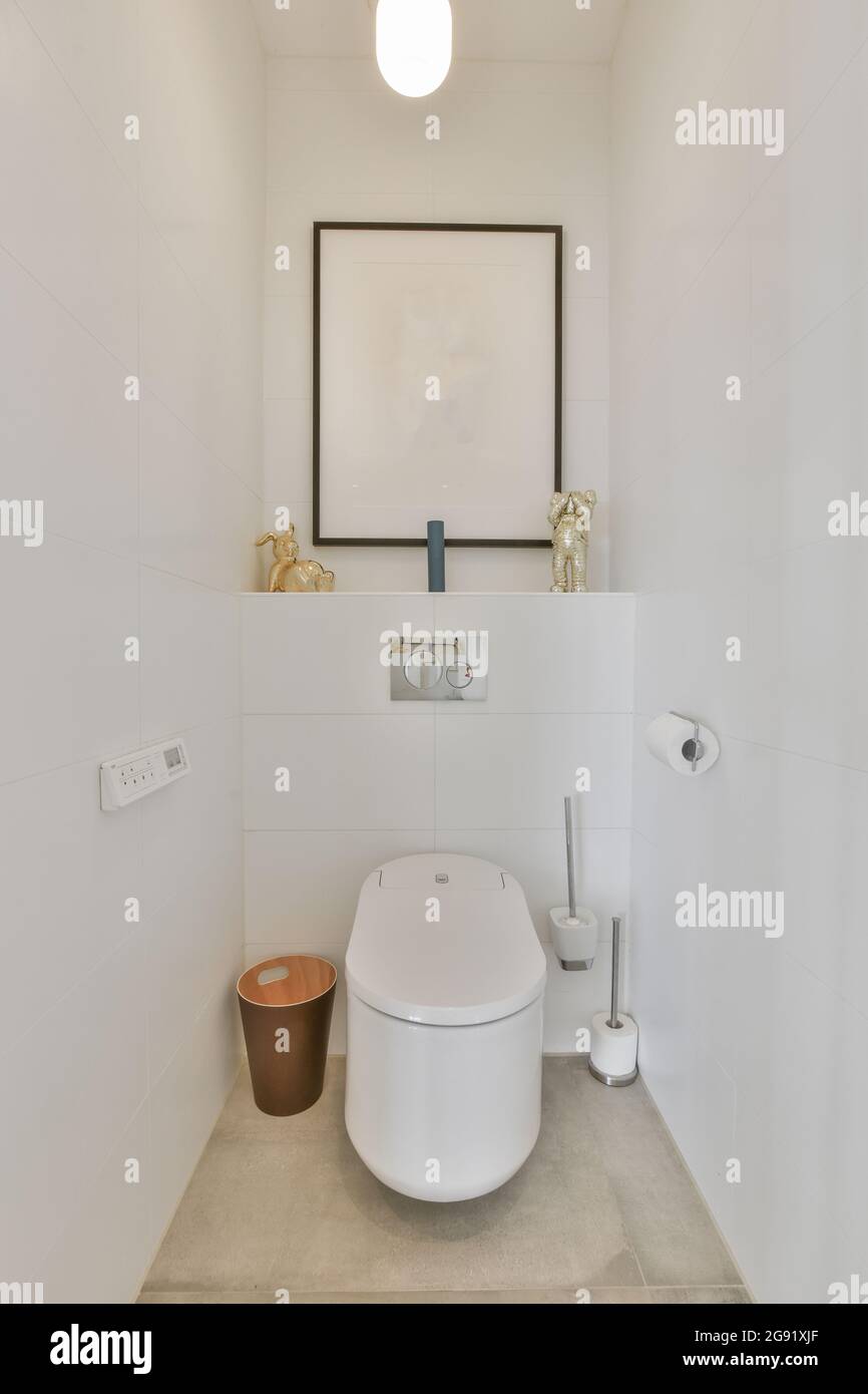 Interior of small clean washroom in miniature style Stock Photo - Alamy