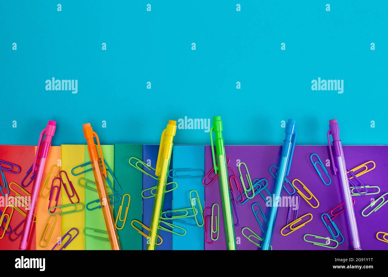 Background with Rainbow Colored School or Office Supplies Stock Photo ...