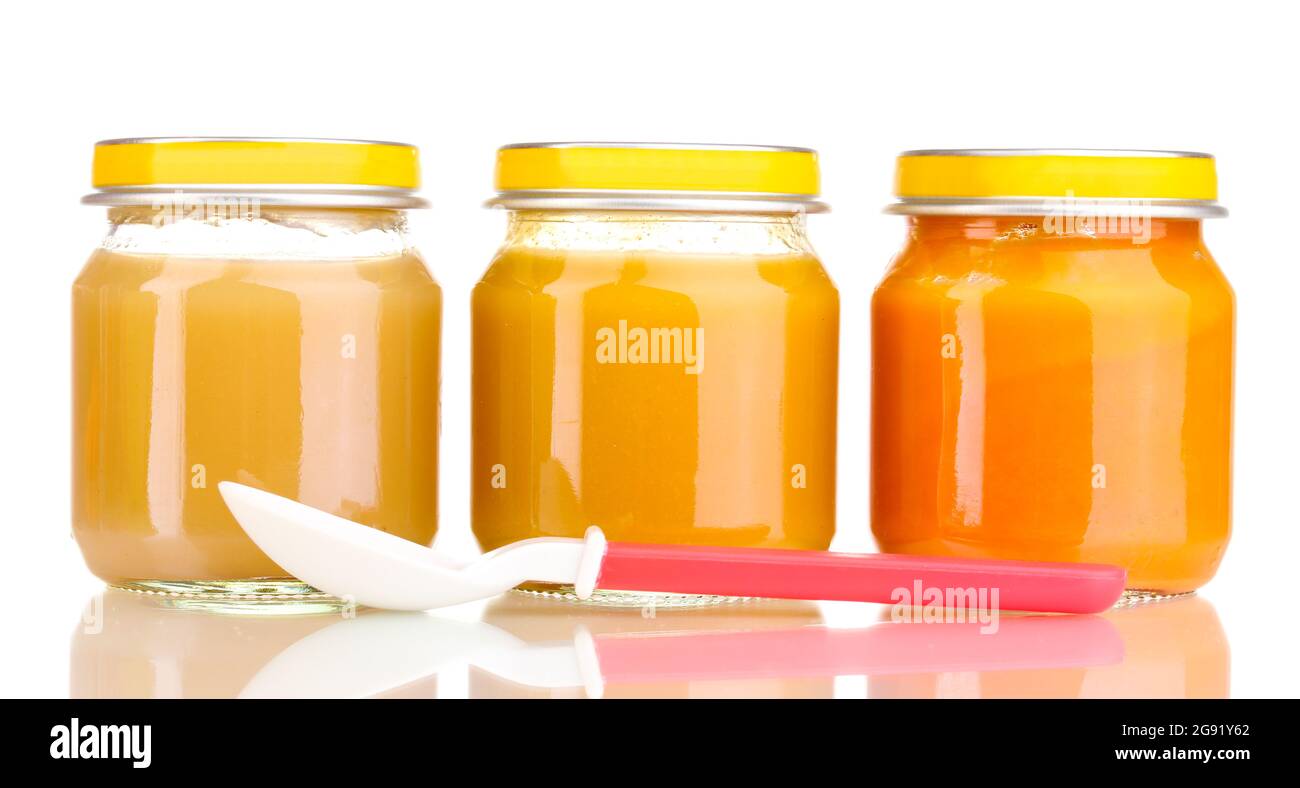 Jars of baby puree and spoon isolated on white Stock Photo - Alamy