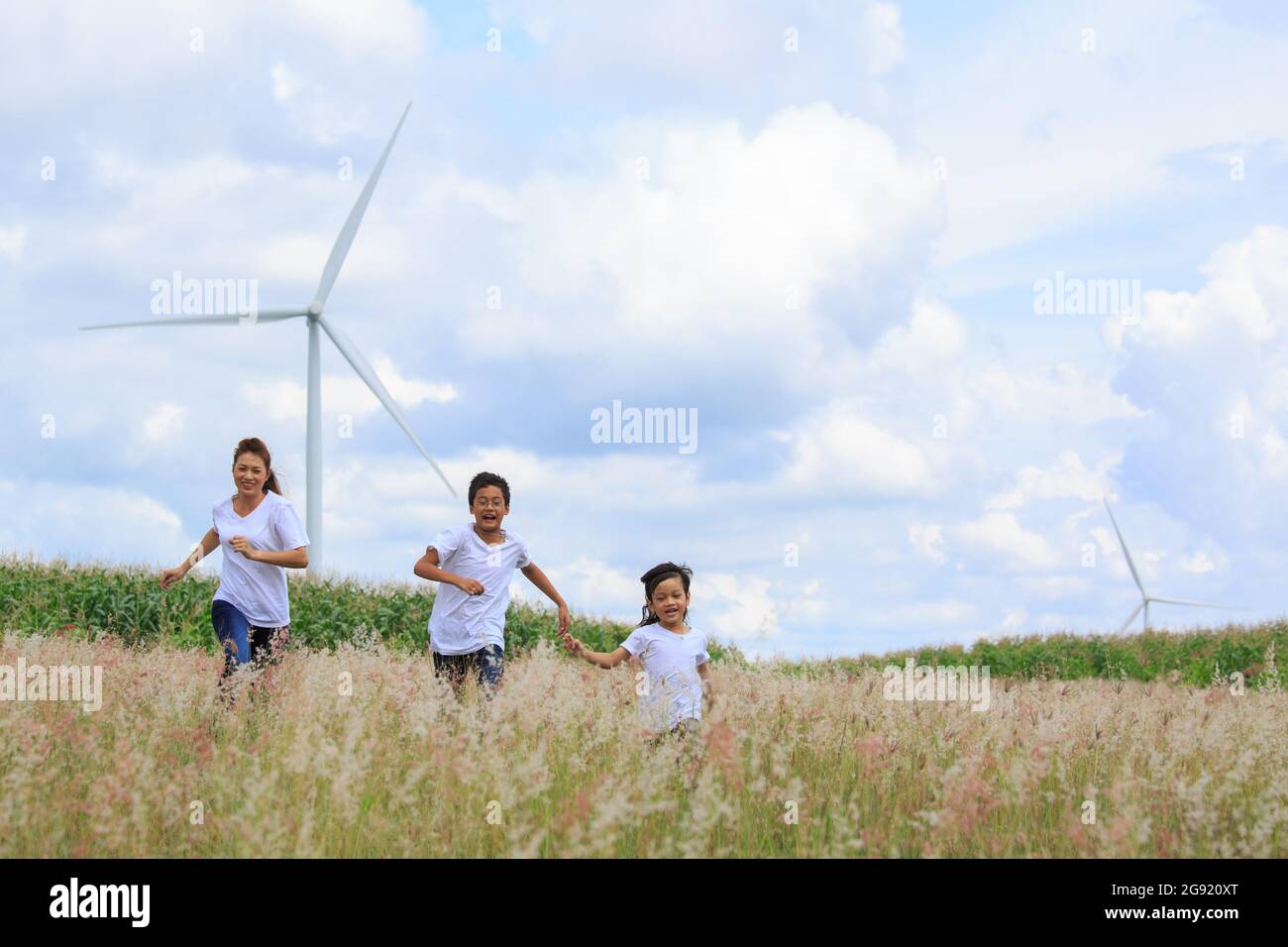 Children with wind turbines hi-res stock photography and images - Alamy
