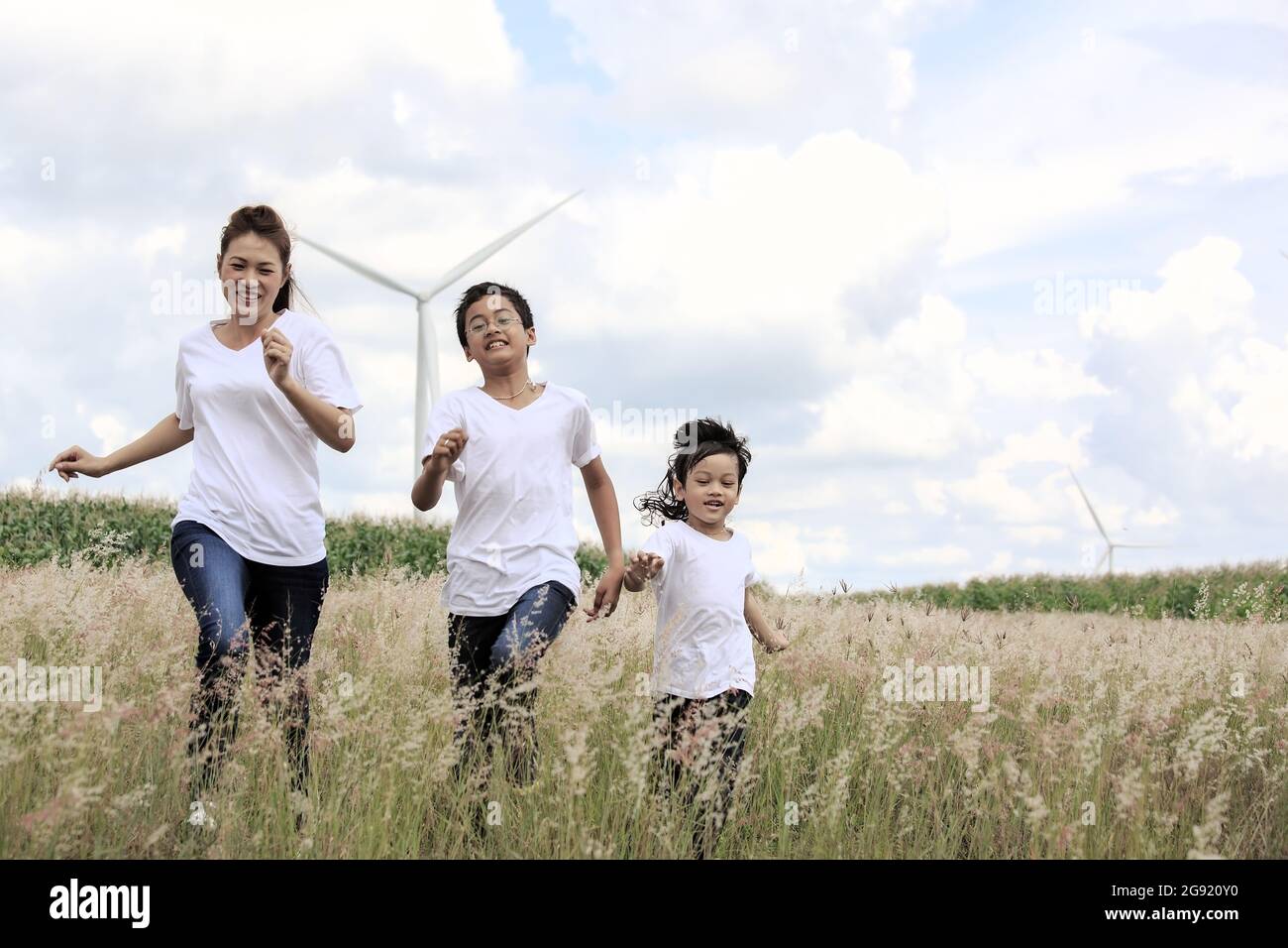 Children with wind turbines hi-res stock photography and images - Alamy