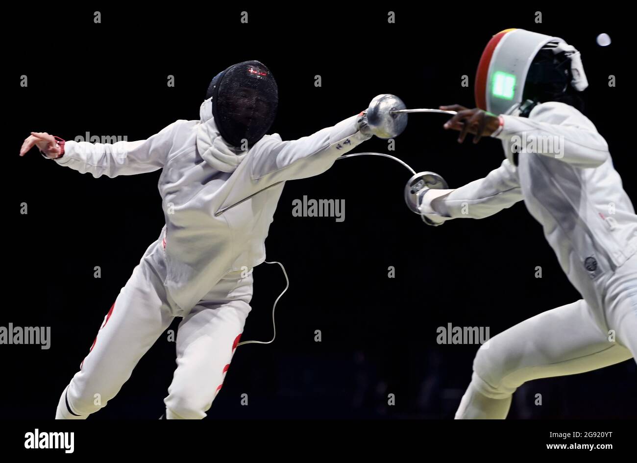 Tokyo, Japan. 24th July, 2021. China's Lin Sheng (L) competes with ...