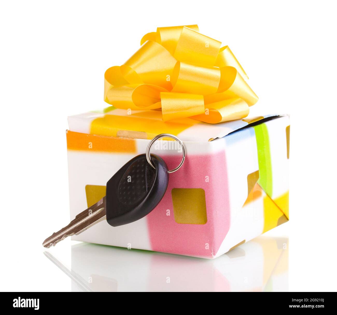 Car key on gift box isolated on white Stock Photo - Alamy
