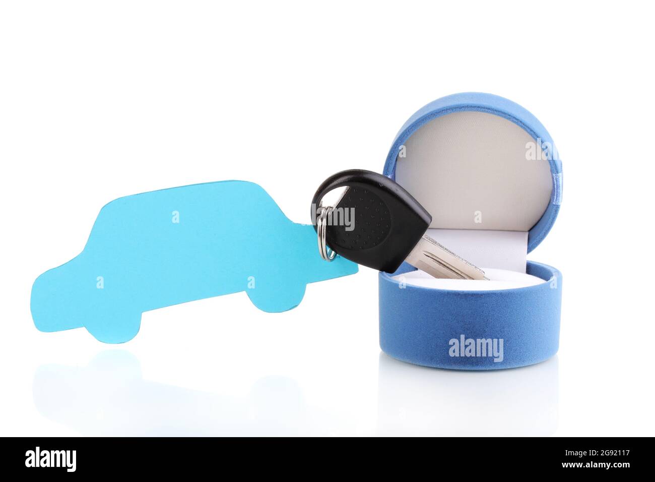 Car key with charm in box isolated on white Stock Photo - Alamy