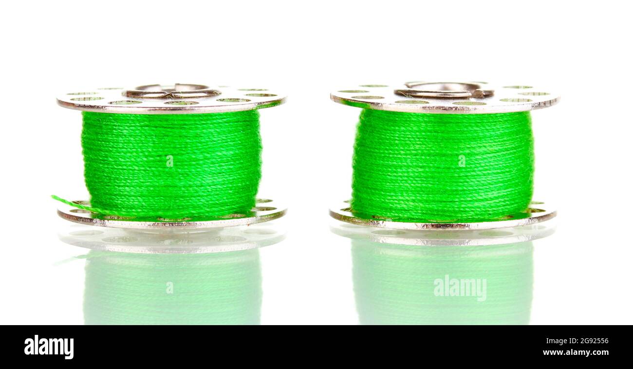Metal spools of thread isolated on white Stock Photo - Alamy