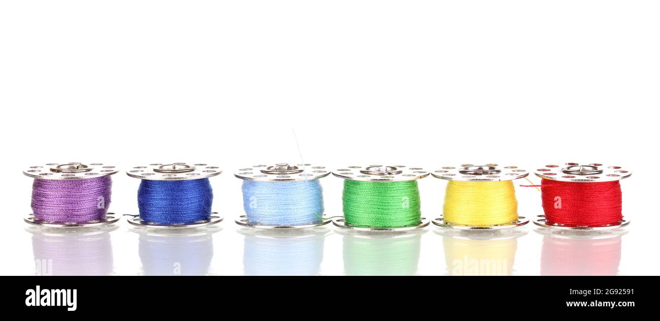 Metal spools of thread isolated on white Stock Photo - Alamy