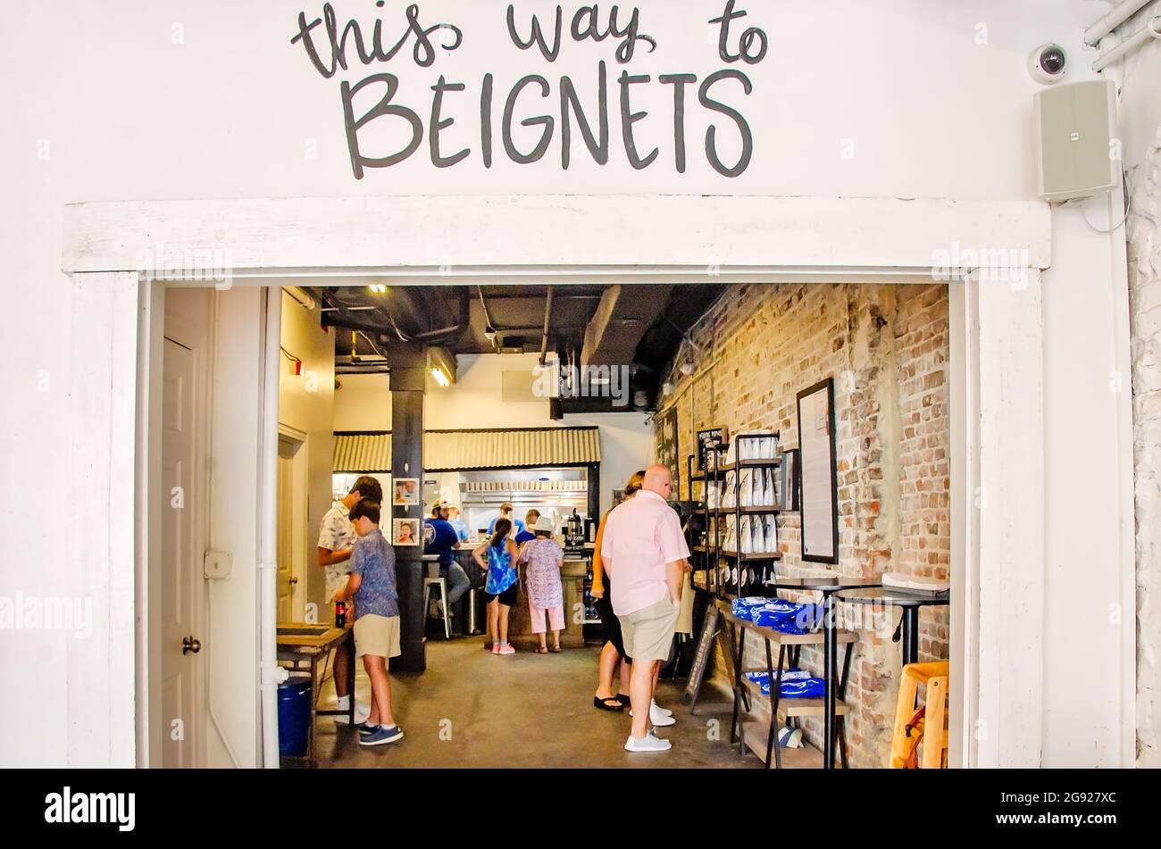 Customers wait to order beignets at Mo’ Bay Beignet Co., July 23, 2021 ...