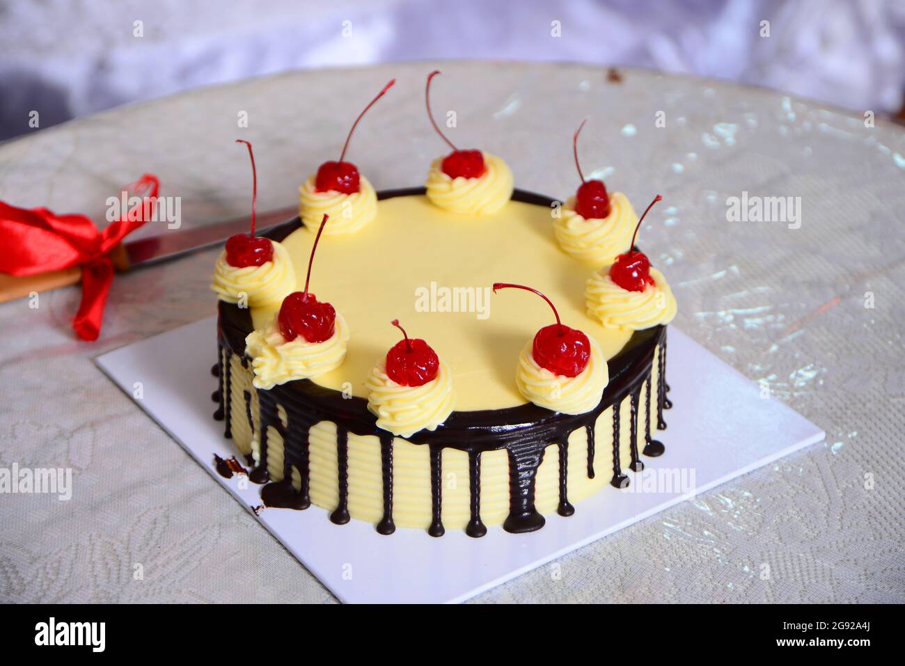 cherry icing cake Stock Photo - Alamy
