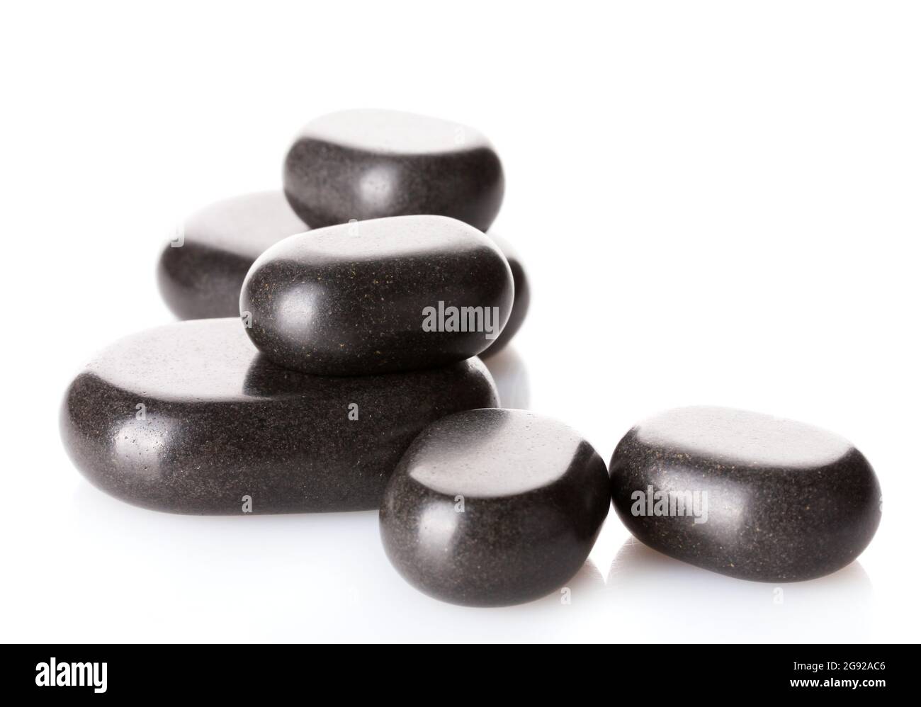 Spa stones isolated on white Stock Photo - Alamy