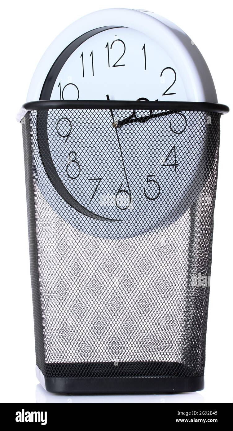 Wall Clock in metal trash bin isolated on white Stock Photo - Alamy