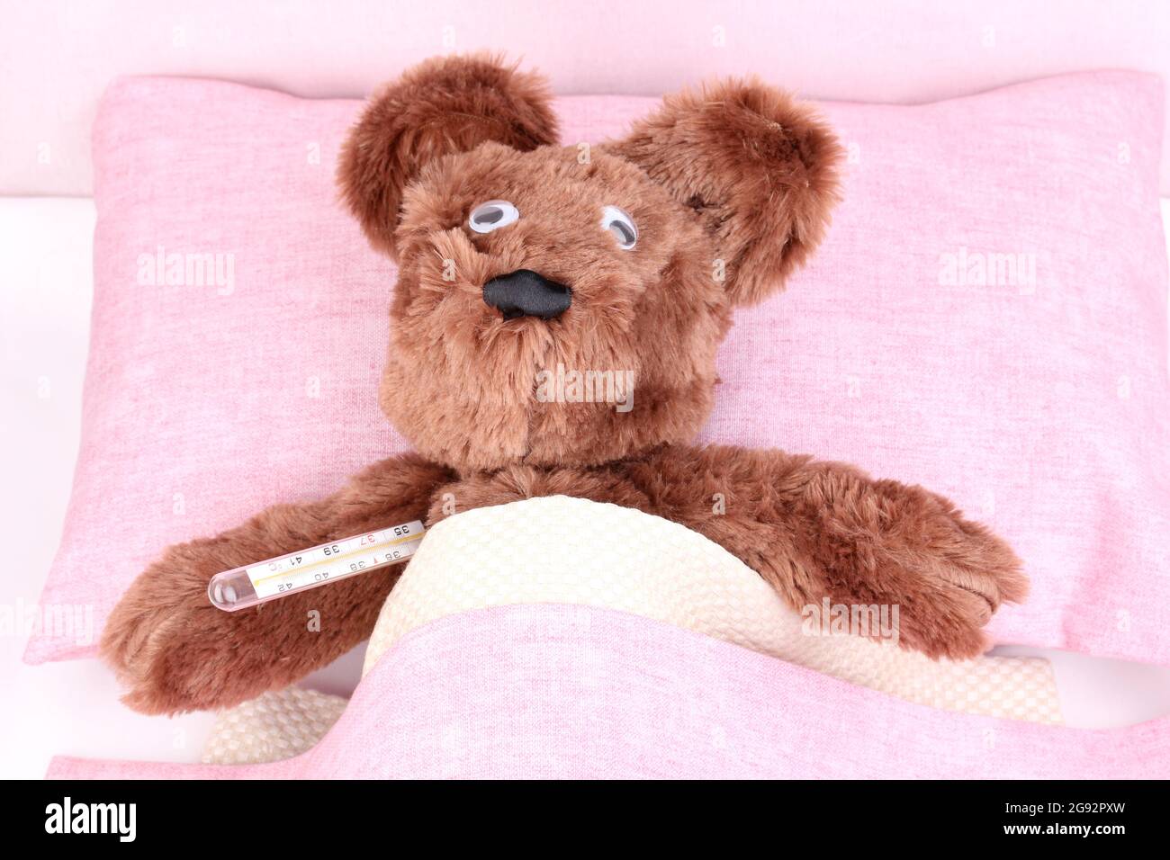 Sick bear in bed Stock Photo - Alamy