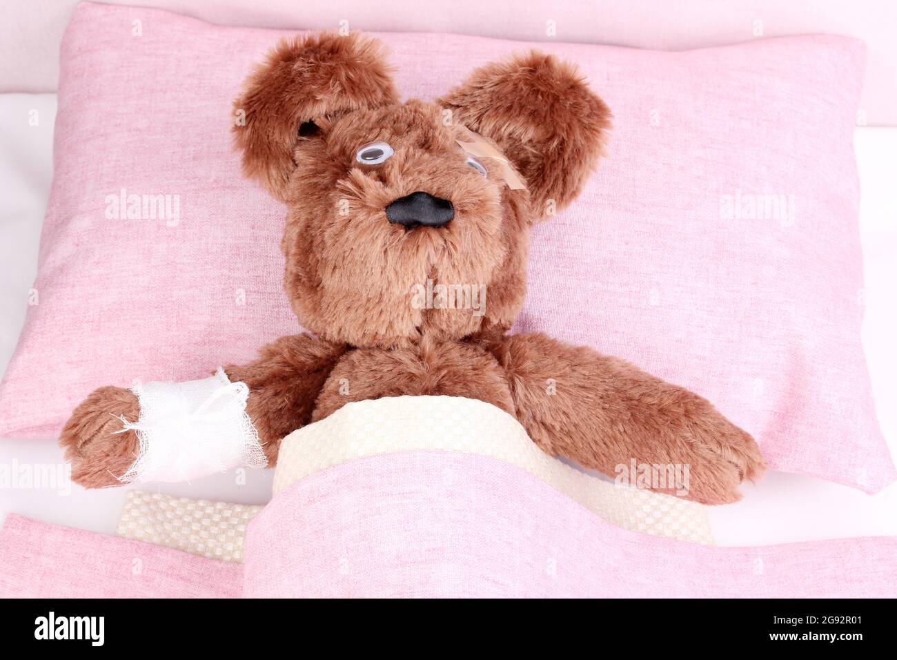 Sick bear in bed Stock Photo - Alamy