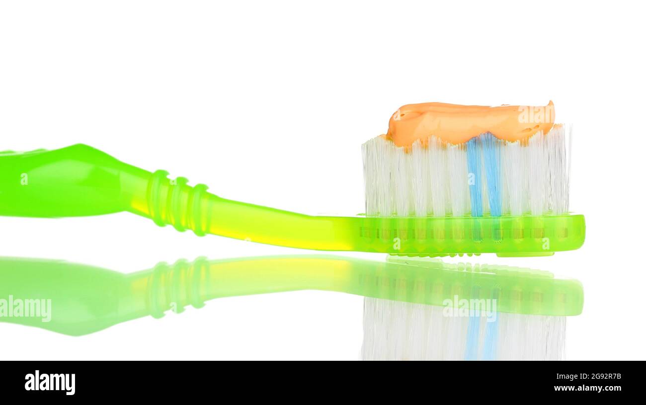 Toothbrush with paste isolated on white Stock Photo - Alamy