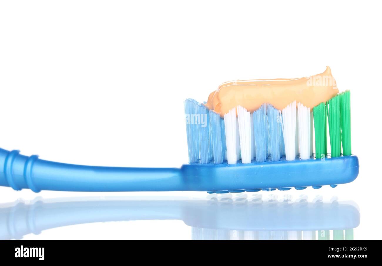 Toothbrush with paste isolated on white Stock Photo - Alamy