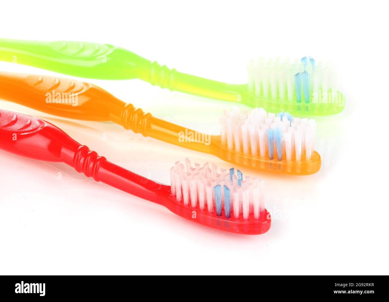Toothbrushes isolated on white Stock Photo - Alamy
