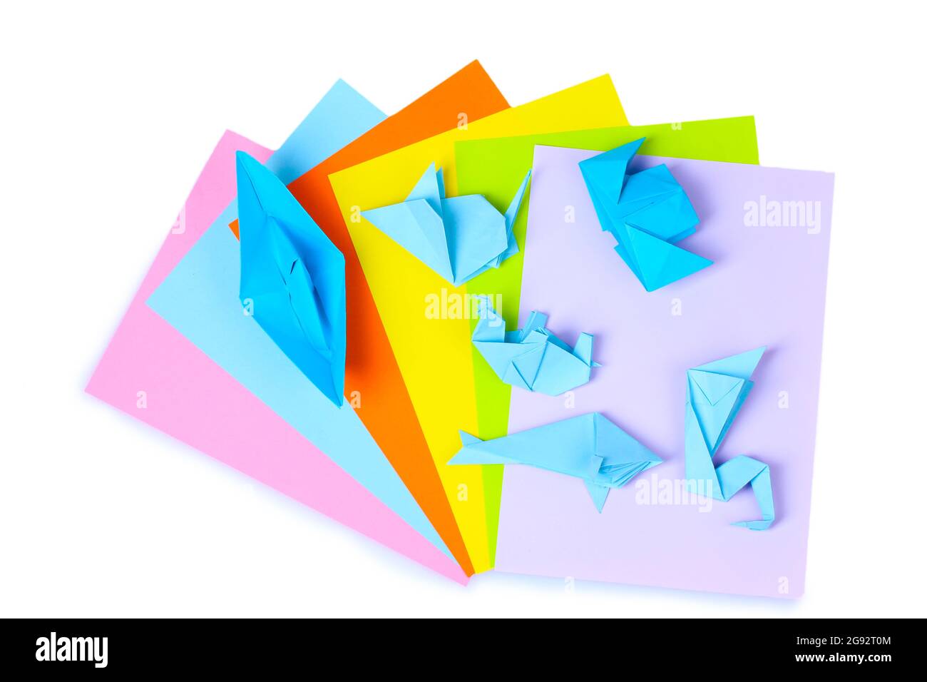 blue origami on bright paper, isolated on white Stock Photo - Alamy