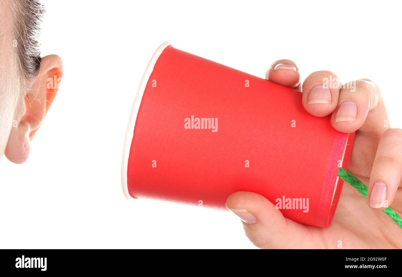 Human ear and paper cup near it close-up isolated on white Stock Photo ...